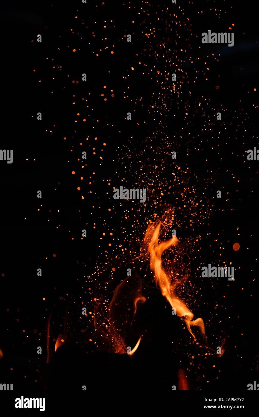 Embers Fly Above Flame from campfire Stock Photo - Alamy