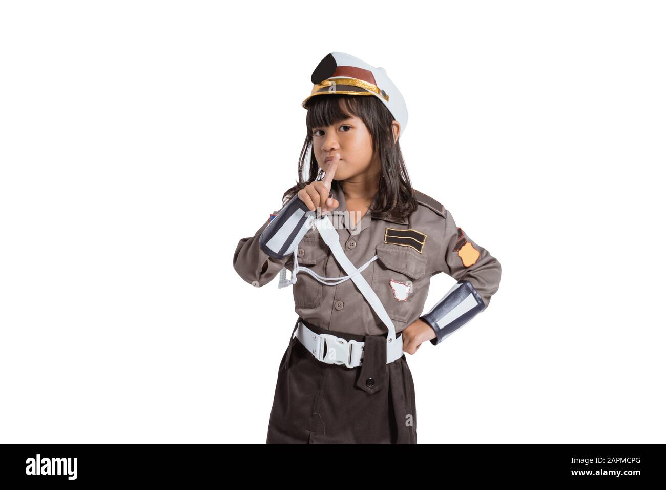 asian little girl wearing police uniform with finger pointing of ...