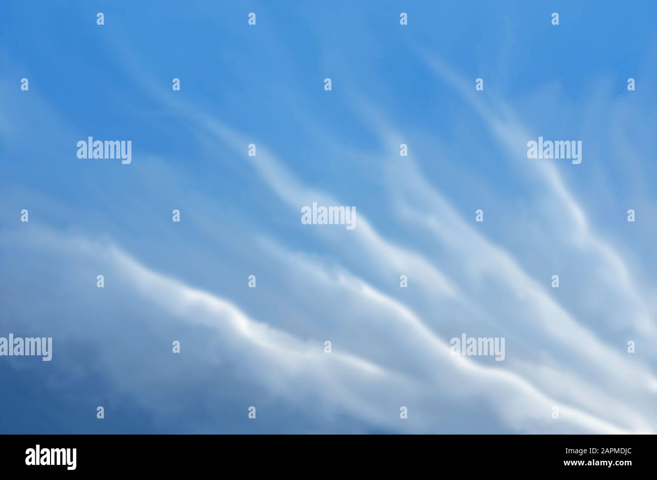 Beautiful rippled clouds spread out across a blue sky, creating a ...