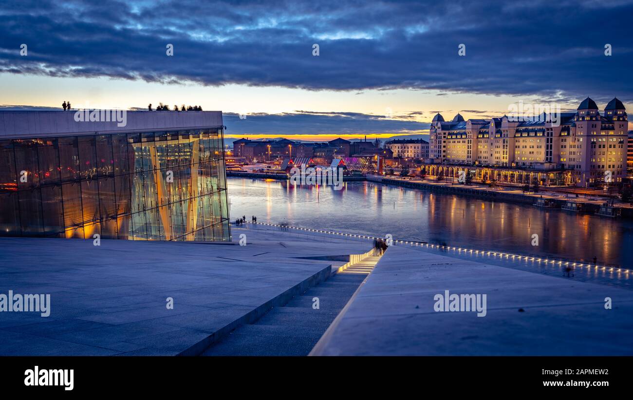 Oslo, Norway - Oslo harbour lookout at sunset as seen from the Opera ...
