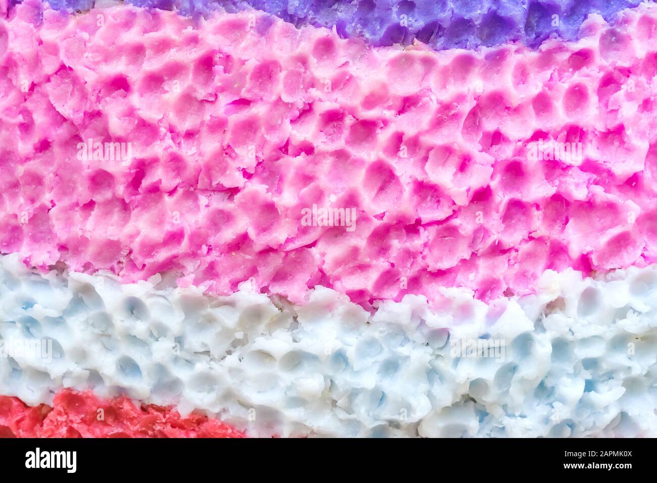 Close up to beautiful of various rough textures and colors of candles ...