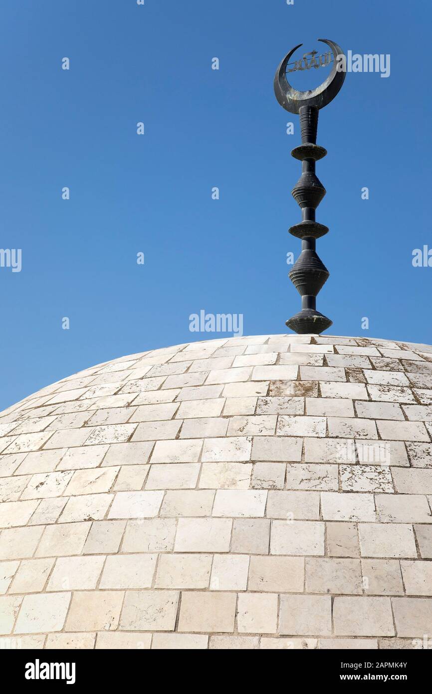 Crescent moon on mosque rooftop in the Christian Quarter of old city ...