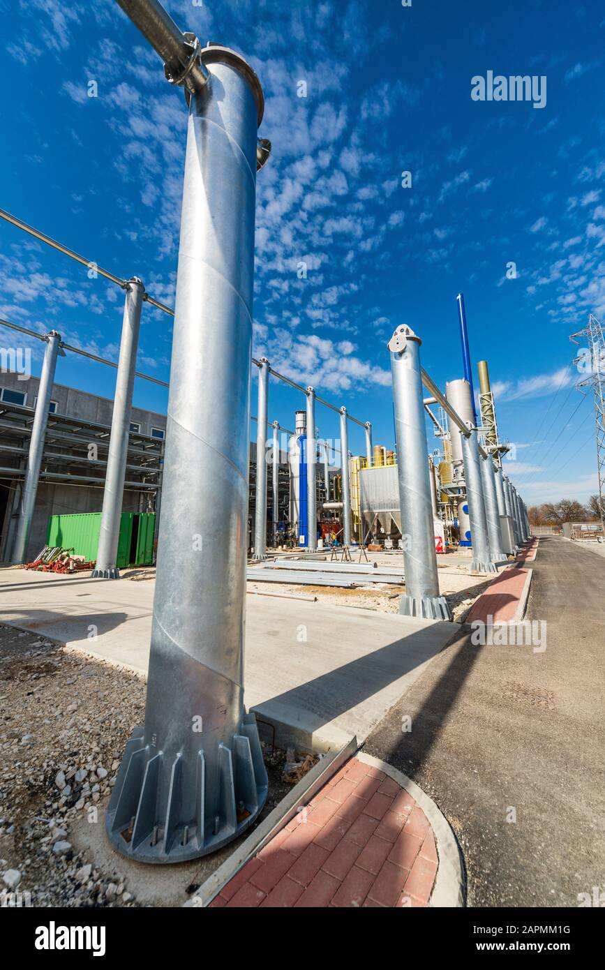 Metal columns in industrial construction plant Stock Photo - Alamy