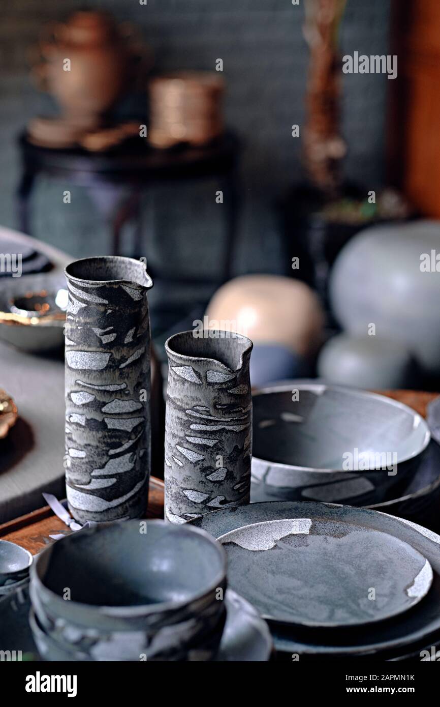 Decorative ceramic set in the interior home. Showcase of handmade ...