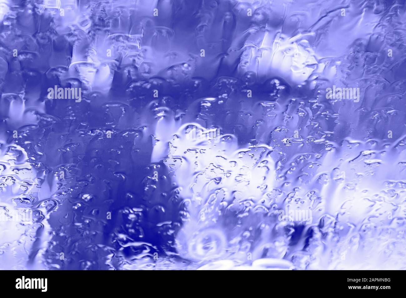Large water drops on a classic blue plain background. Close up. Design ...