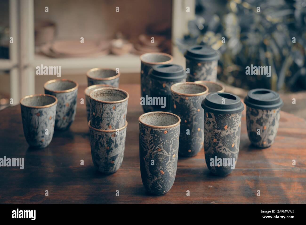 Decorative ceramic set in the interior home. Showcase of handmade ...