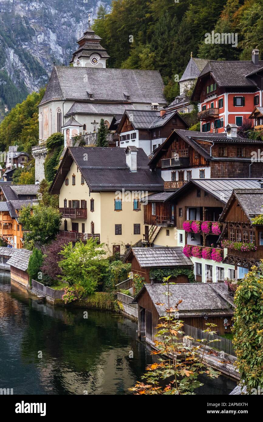 Scenic picture-postcard view of famous Hallstatt mountain village in the Austrian Alps at ...