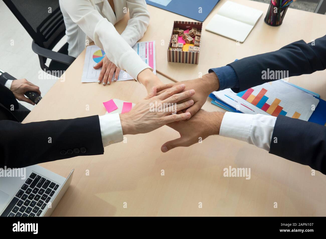 Business people give hands stack or holding each other for Unity and ...