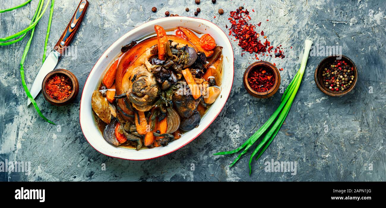 Delicious roast pork knuckle with vegetable.Traditional German cuisine ...