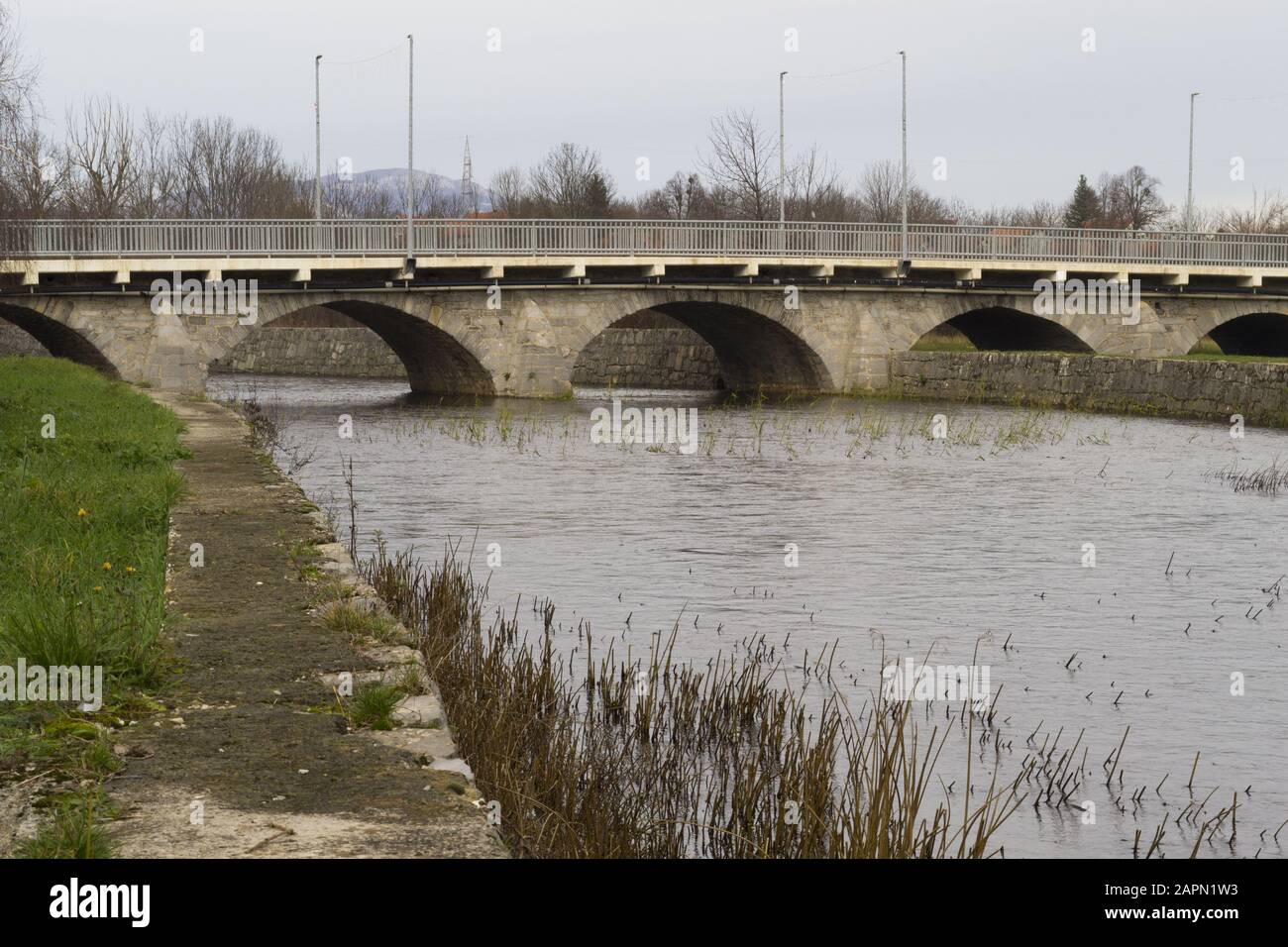 Panoramic shot of an old stone arc bridge over Otuca river in Gracac ...