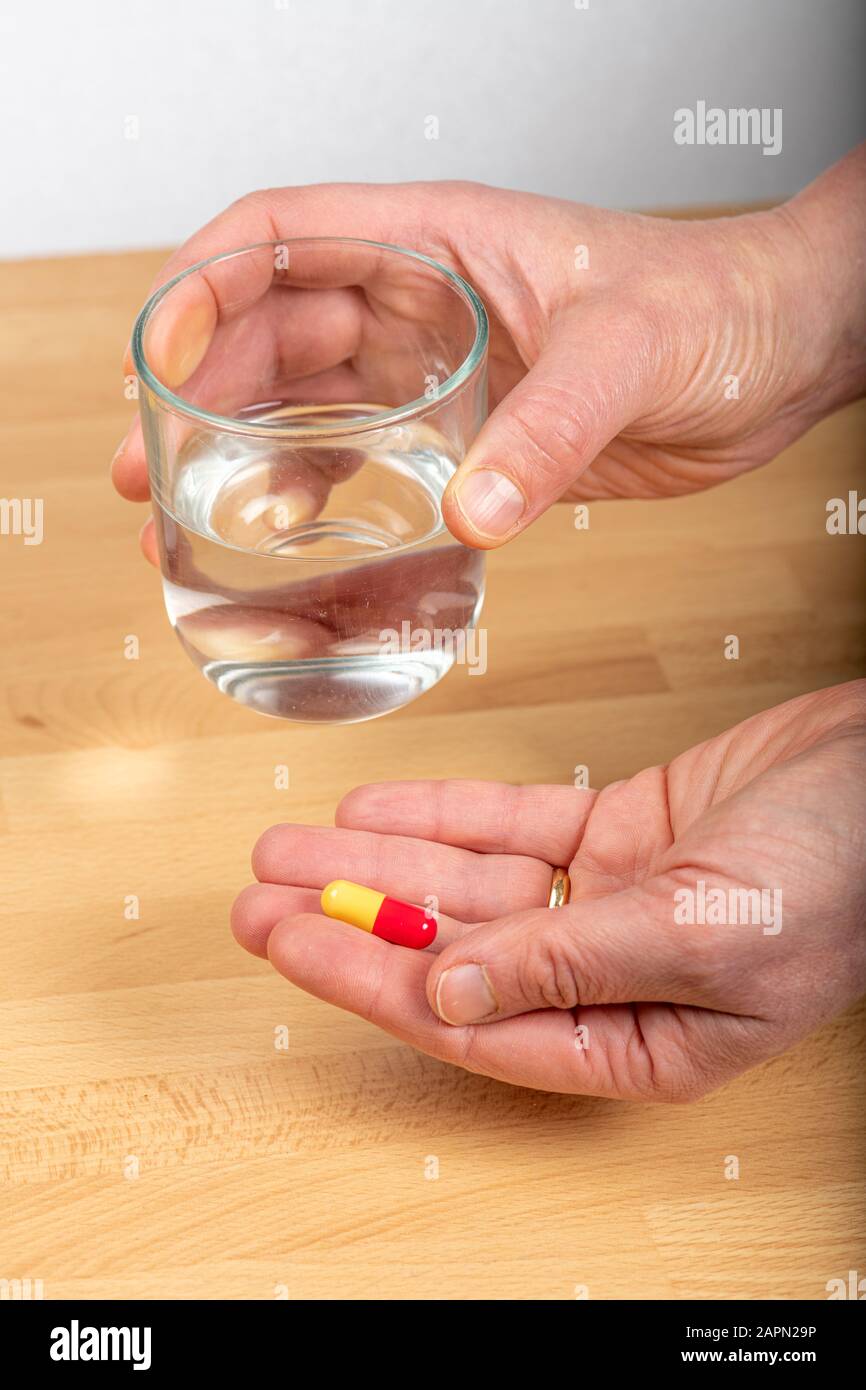 Medicine : tablets in the hand of a woman, woman taking medicine Stock ...