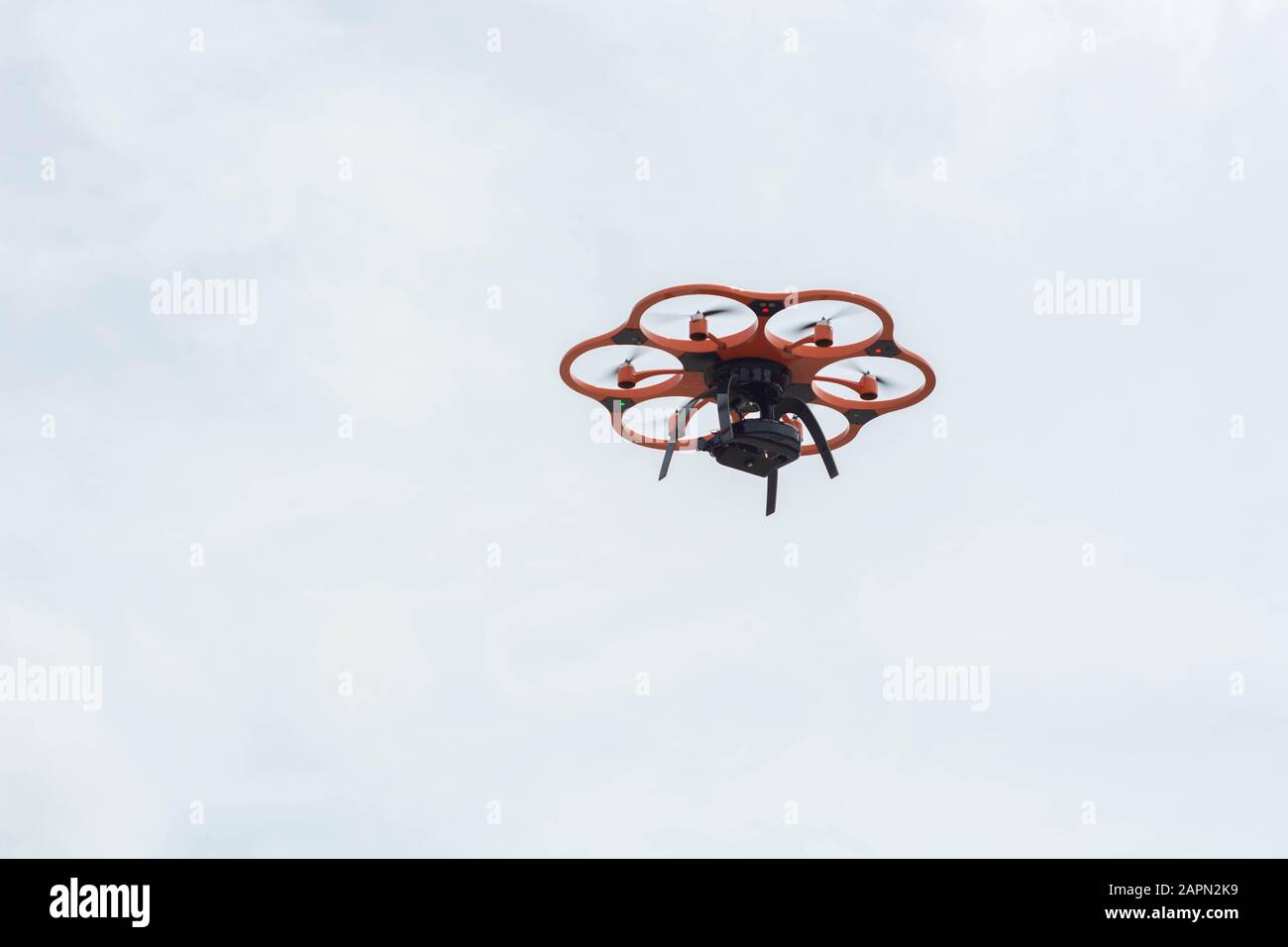 SAN SALVADOR, EL SALVADOR - Jan 13, 2020: View of an orange hexacopter ...