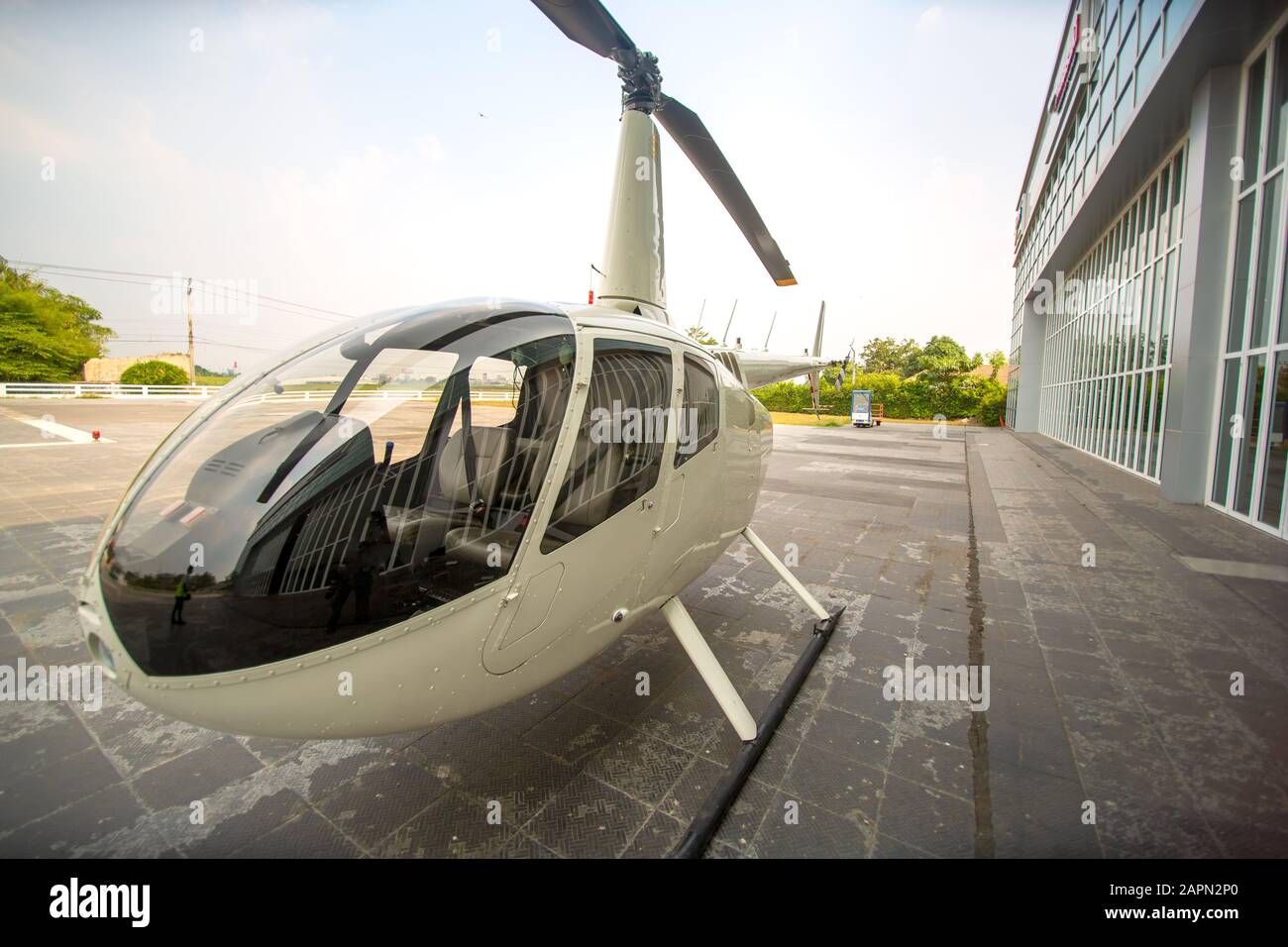 private commercial Helicopter parking by airport terminal Stock Photo ...