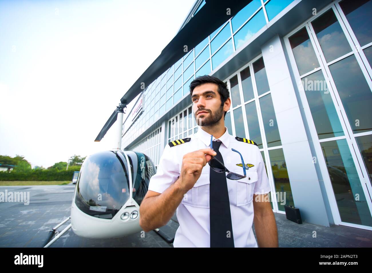Portrait helicopter pilot in uniform hi-res stock photography and ...