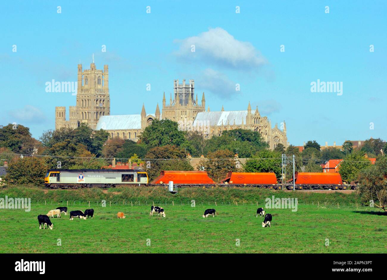 A class 60 diesel locomotive number 60061 working a train of empty RMC ...