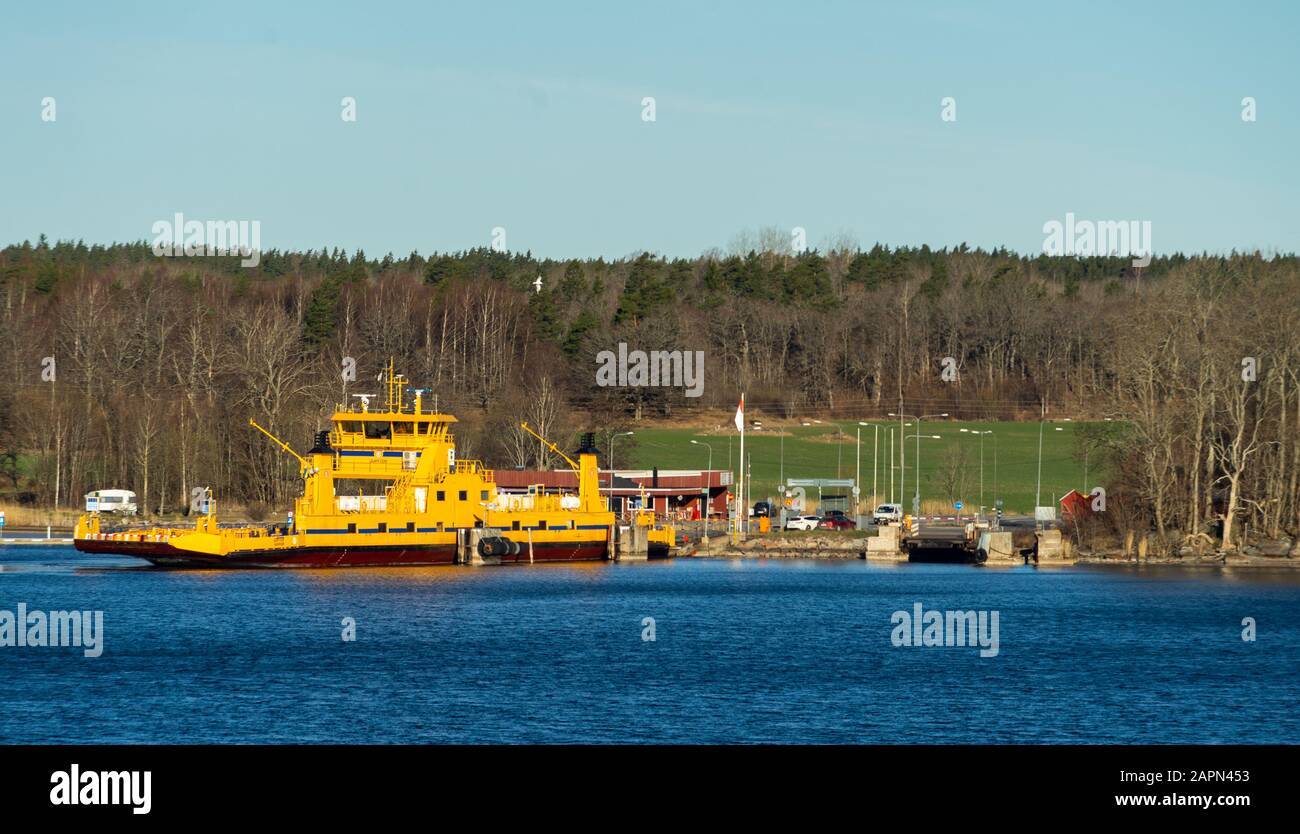 Yellow ferry for transporting cars and people from the islands of the ...