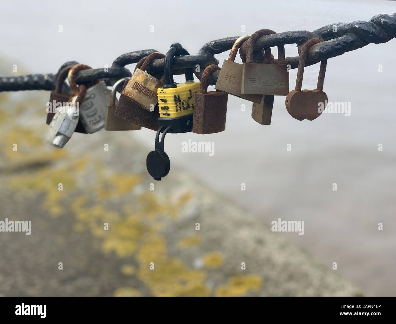 Old hanging sign with anchor hi-res stock photography and images - Alamy
