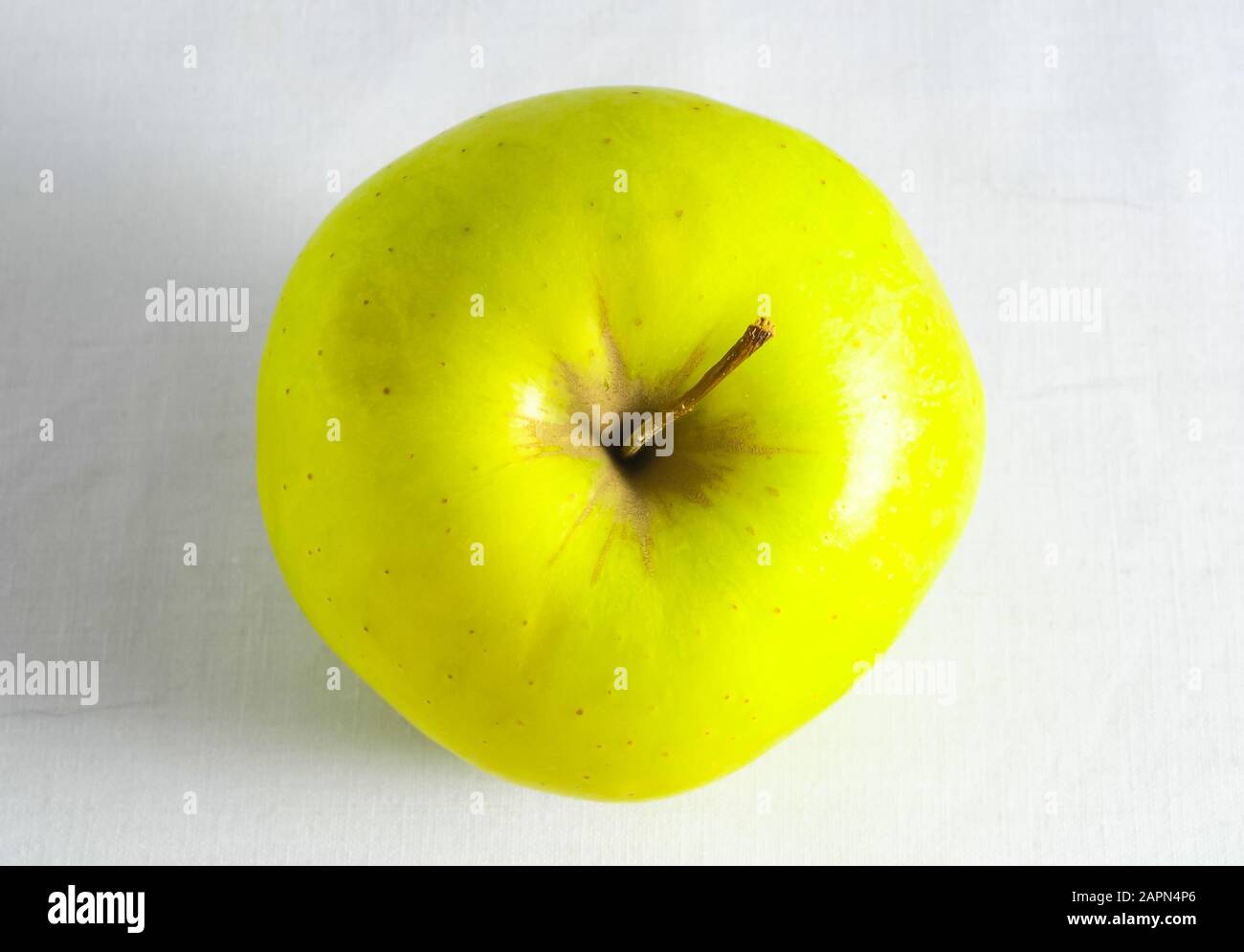 High angle shot of a yellow-colored fruit with a white color in the ...