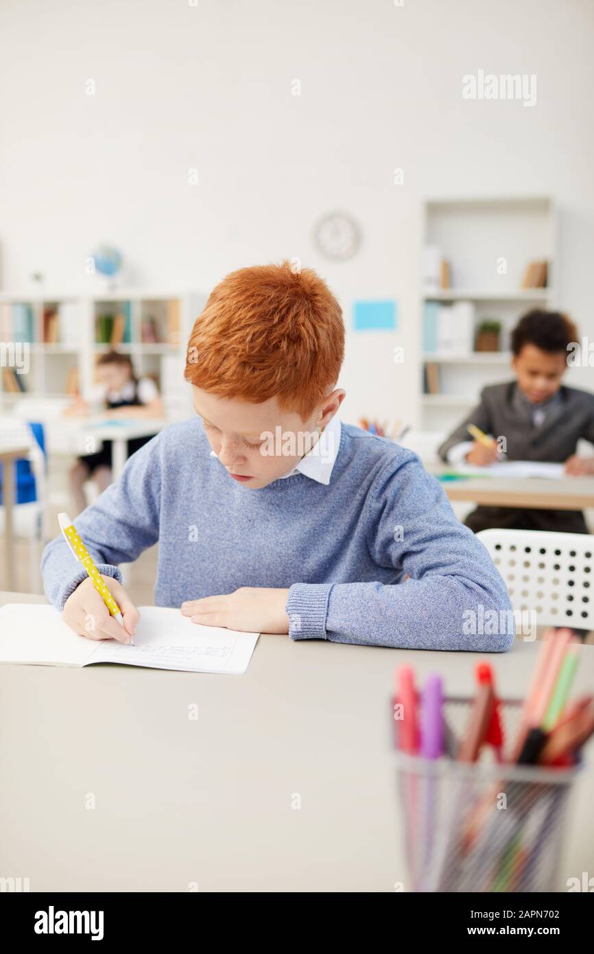 Children school writing exam hi-res stock photography and images - Alamy