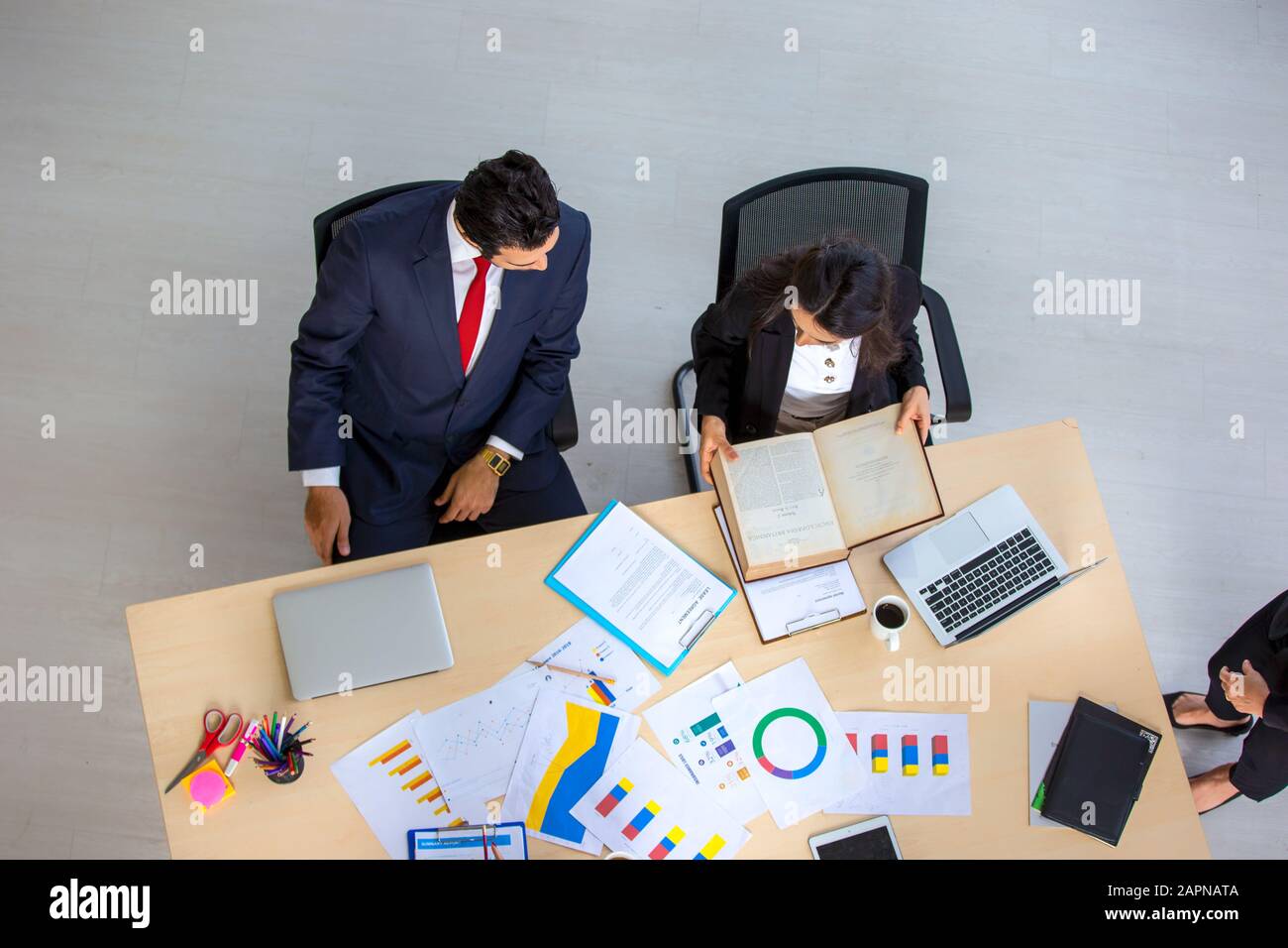 young business team working together at office. Manager pointing at a ...