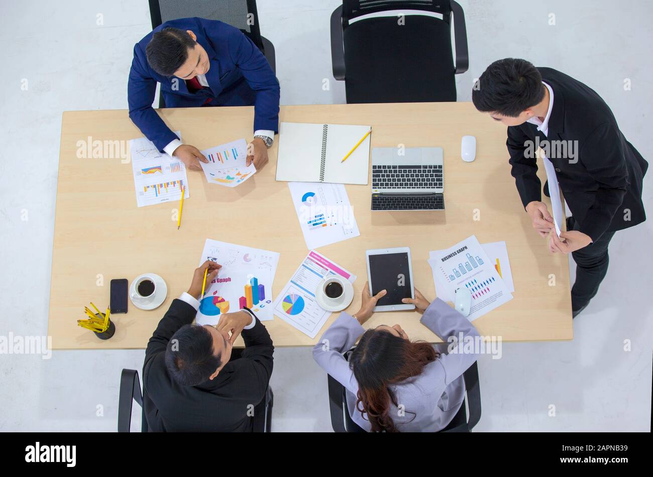 young business team working together at office. Manager pointing at a ...