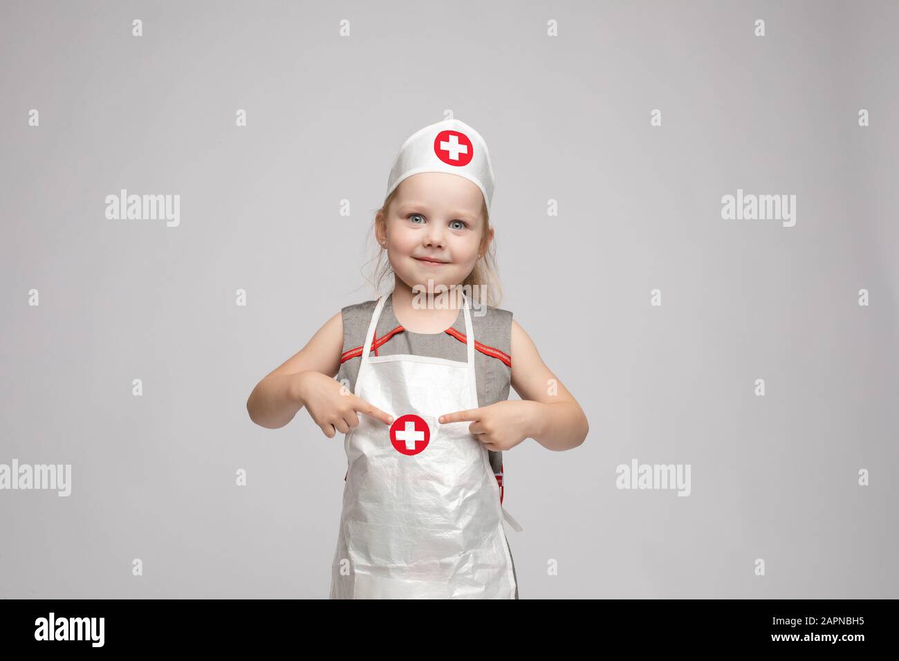 Adorable girl in doctor's uniform.She is a doctor Stock Photo - Alamy