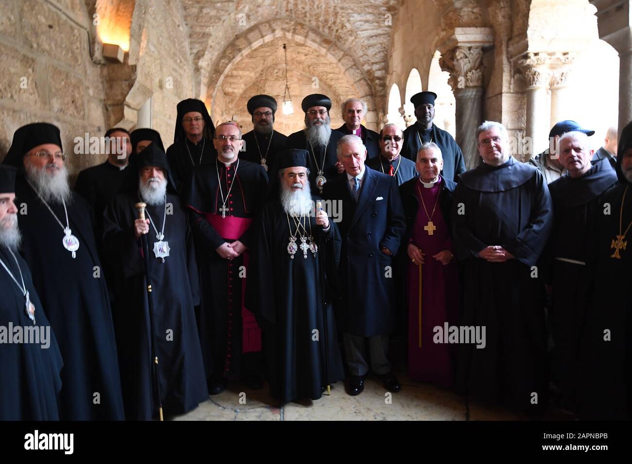 The Prince of Wales (centre) during a visit to the Church of the ...