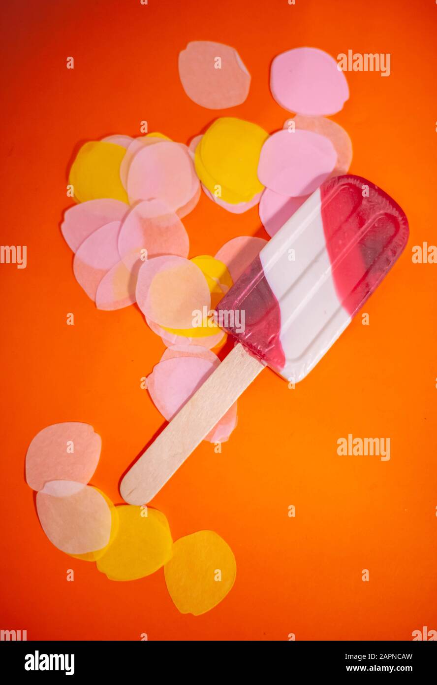 Objects & Still life - Lollipop on stick with scattering of coloured ...