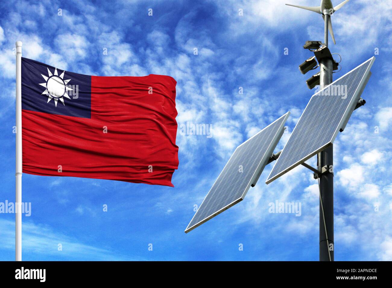 Solar panels on a background of blue sky with a flagpole and the flag ...