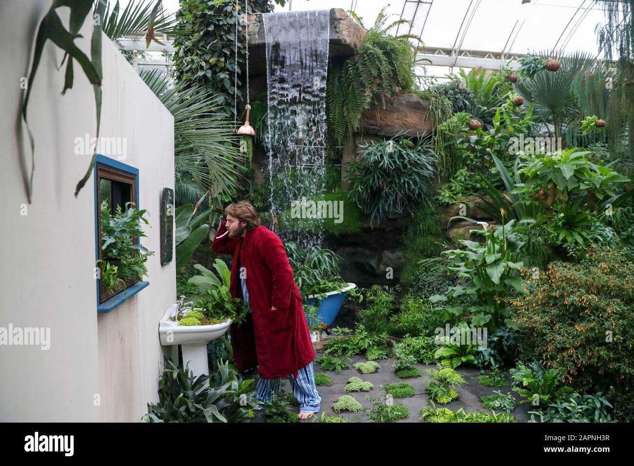 Staff member Callum Munro-Faure poses during a preview for the Giant ...