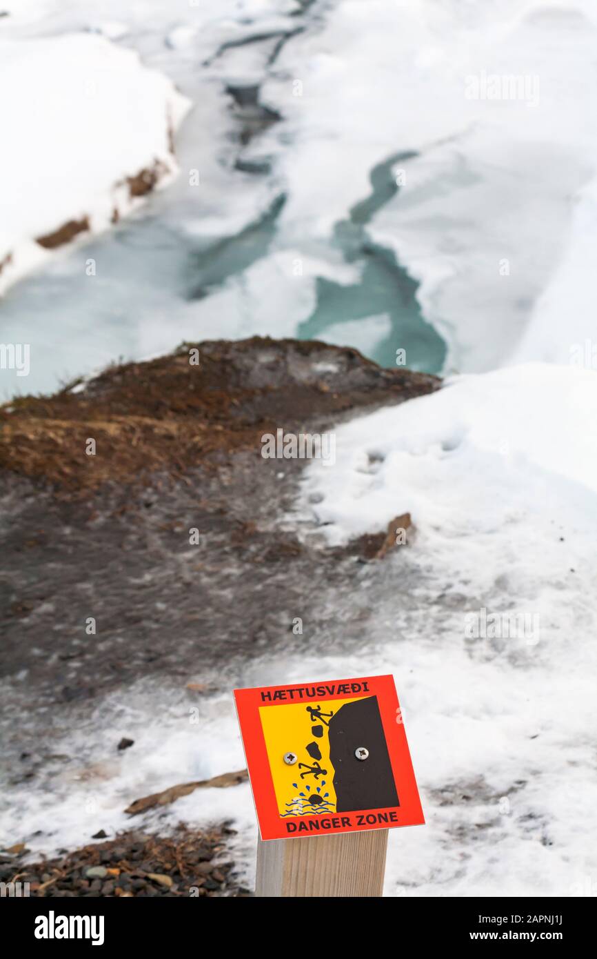 Danger Zone sign at Kirkjufell waterfall Kirkjufellsfoss waterfall at ...