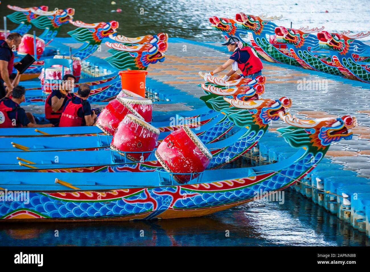 A row of Dragonboats in a river in Taipei Stock Photo - Alamy