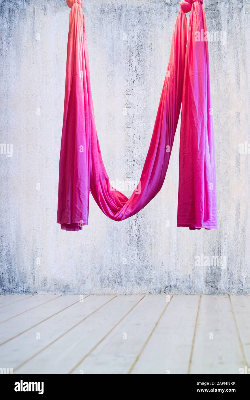 Pink hanging hammock indoor Stock Photo - Alamy