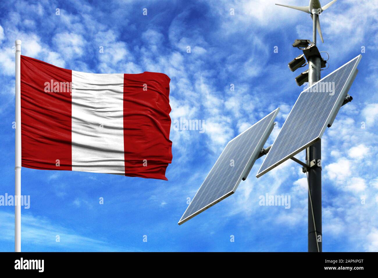 Solar panels on a background of blue sky with a flagpole and the flag ...