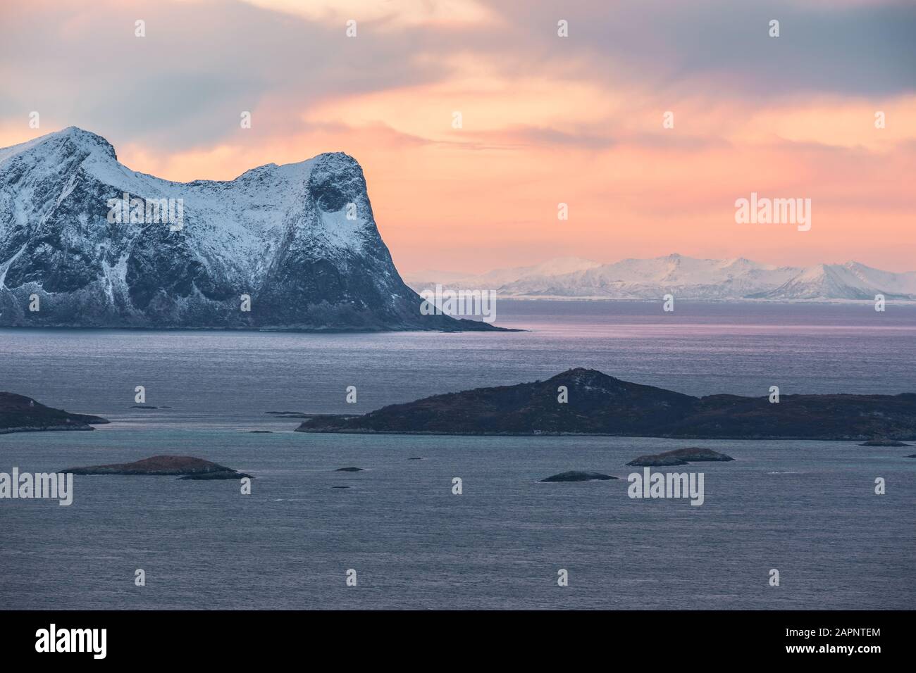 Minimalistic artic landscape under colorful and dramatic sky at sunset ...