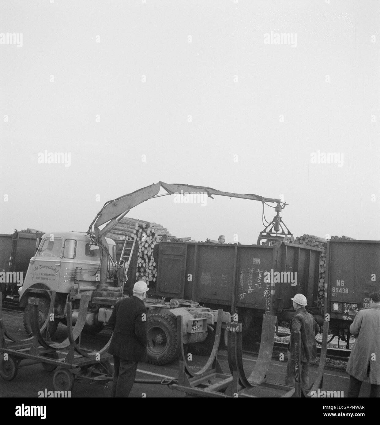 wood storage places, tow trucks, logs, containers, workers Date ...