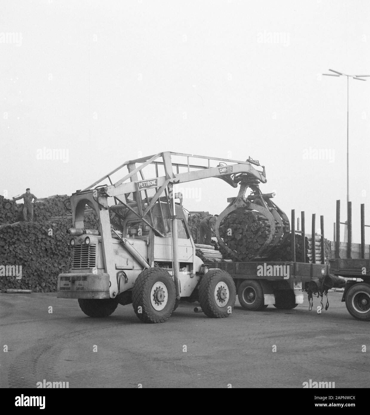 woodworking, vehicles, hoist work, wood storage, workers, carts ...