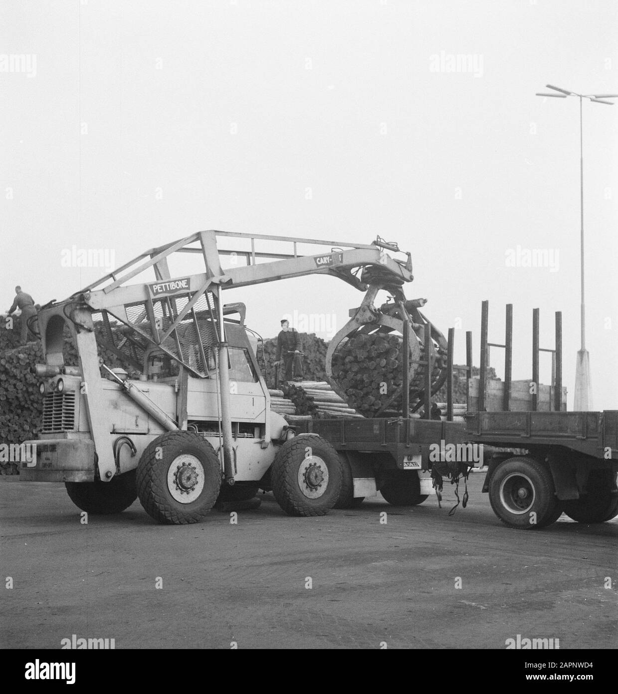 woodworking, vehicles, hoist work, wood storage, workers, carts ...