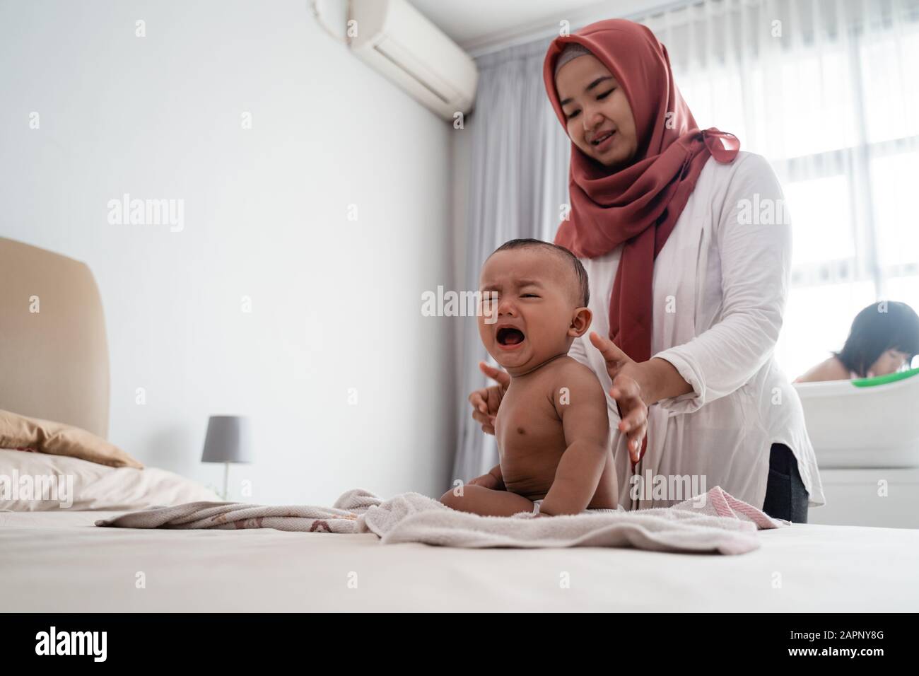 Toddler cry scarf hi-res stock photography and images - Alamy