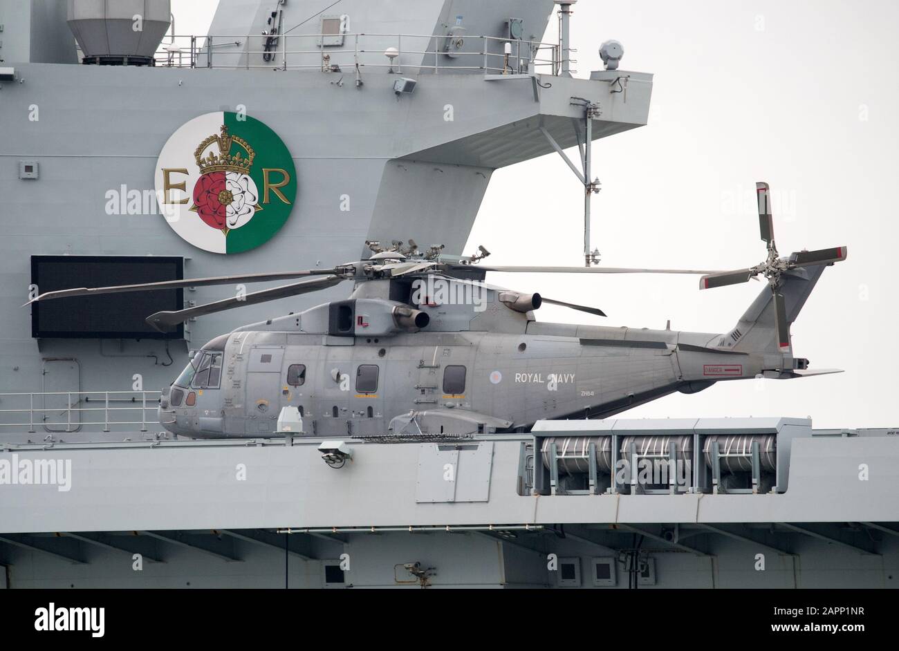 A Merlin helicopter on board the Royal Navy aircraft carrier HMS Queen ...