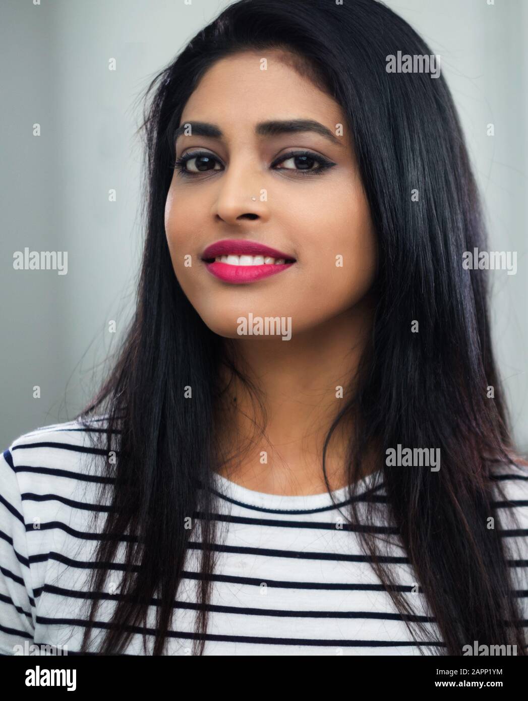 Young indian woman face close-up Stock Photo - Alamy