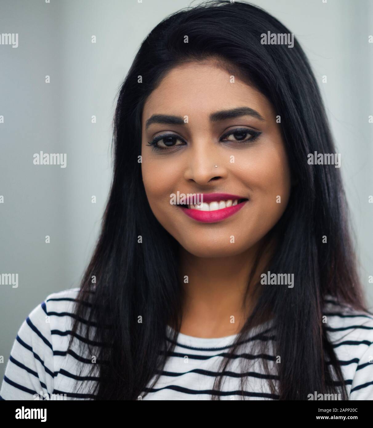 Young indian woman face close-up Stock Photo - Alamy