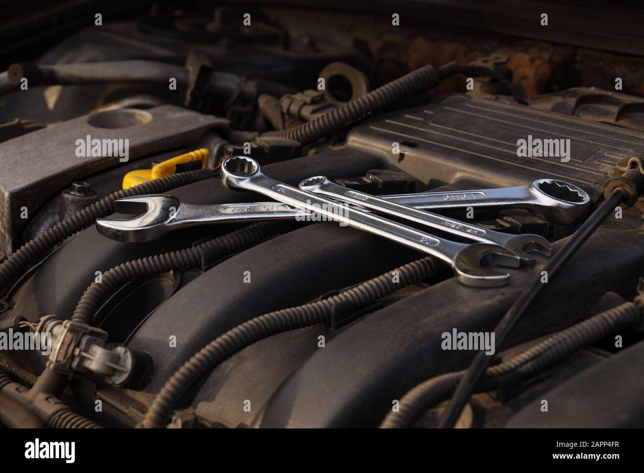 Wrenches for repair lying in the engine compartment. Car repair ...