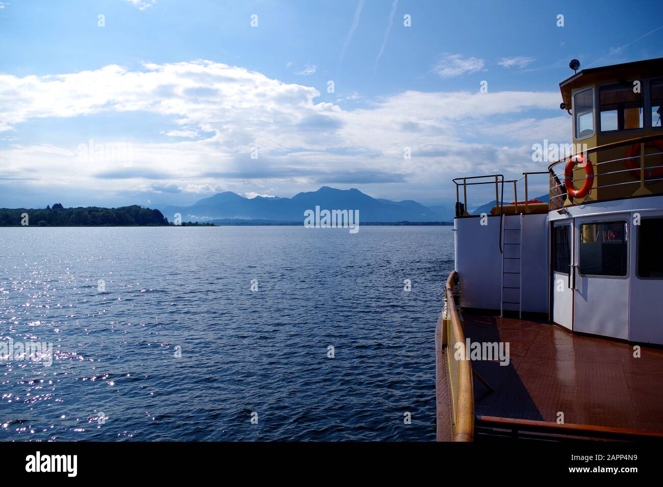 A view on the Chiemsee lake (Bavaria, Germany). There is an island and ...