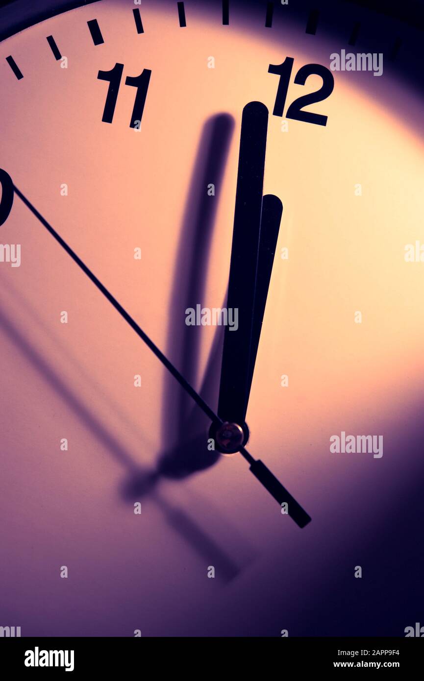 pocket watch indicating one minute to midnight, concept for doomsday ...