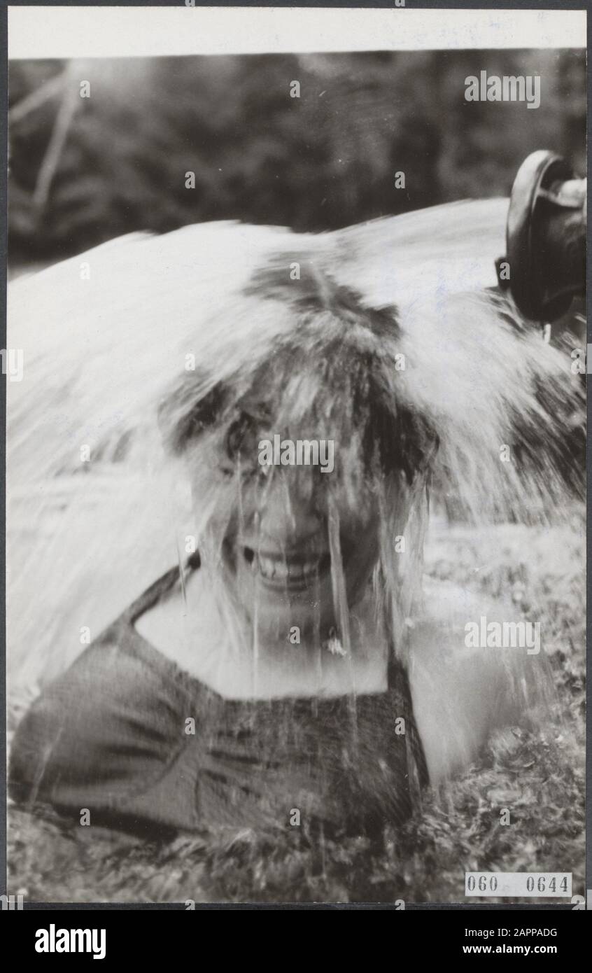 Woman under the wave hi-res stock photography and images - Alamy