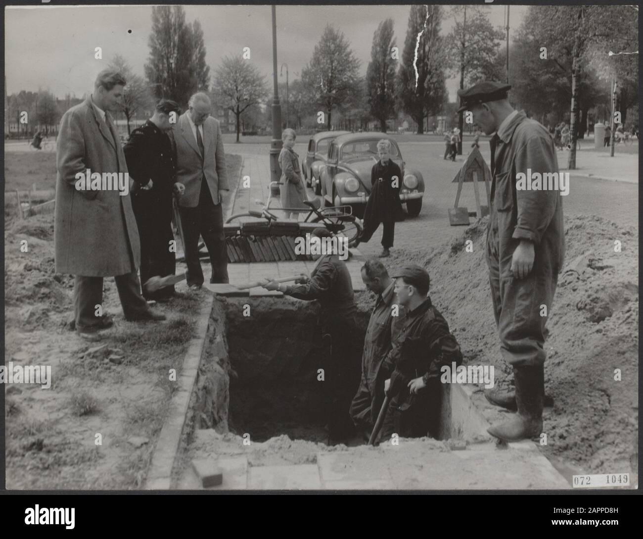 Clearance of an unexploded bomb, under a street, by the Mine Cleanup ...