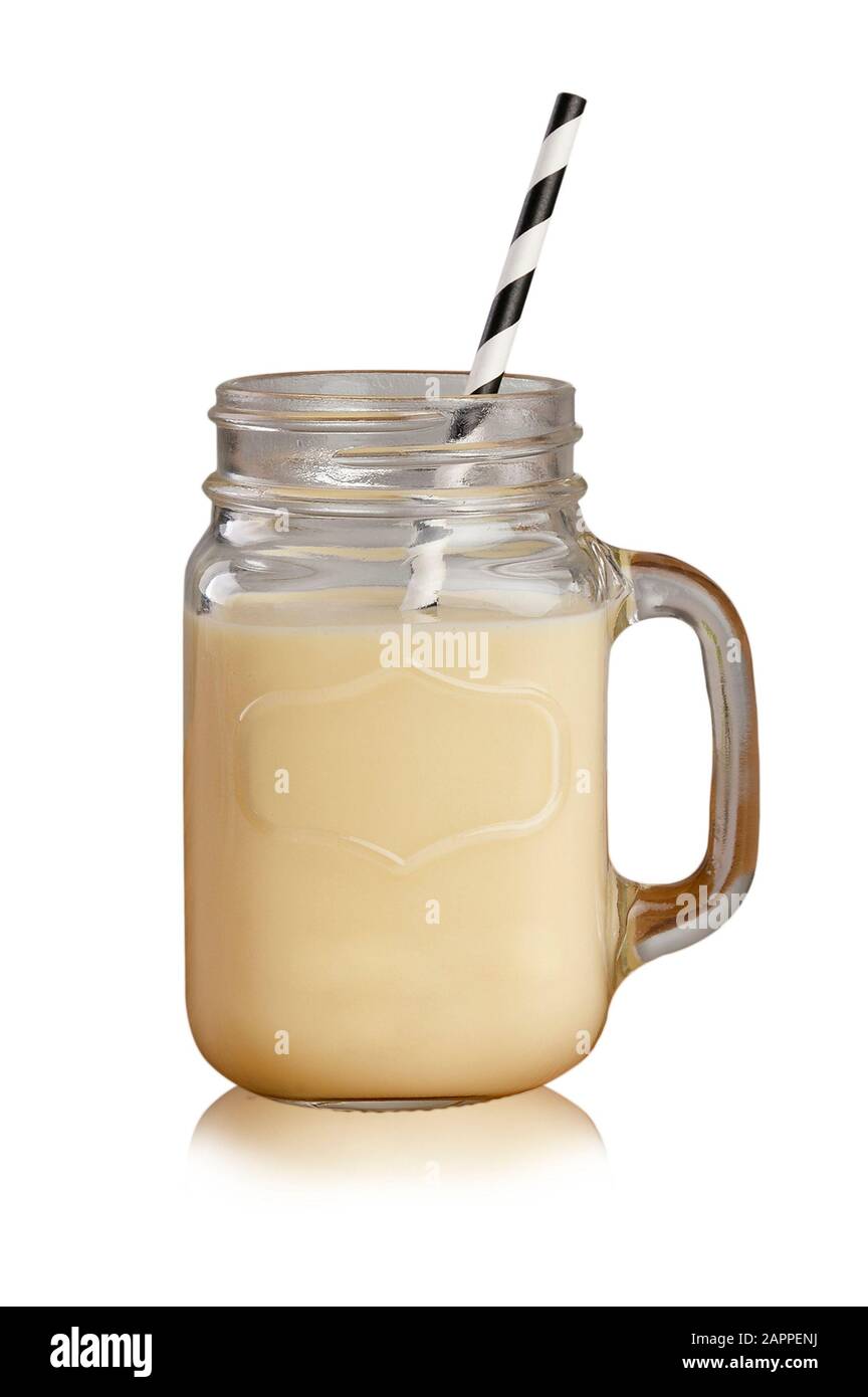 Individual banana milkshake in a Mason Jar glass, with paper straw ...