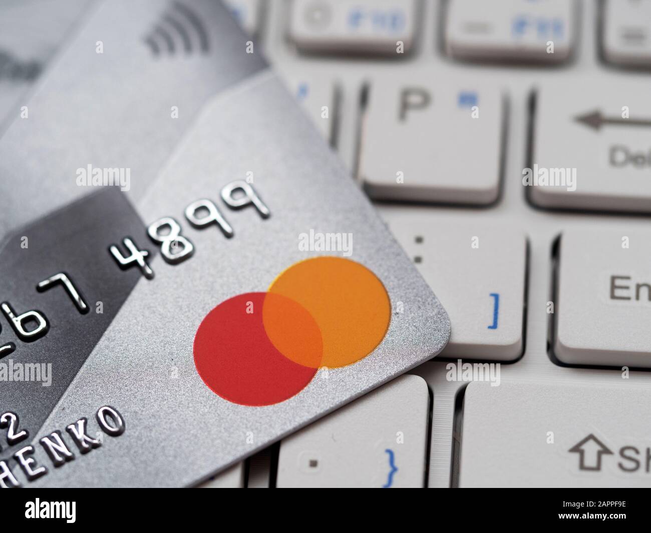 Bank cards mastercard on computer keyboard Stock Photo - Alamy
