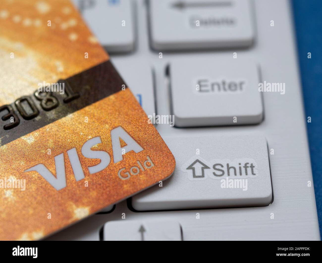 Bank card Visa Gold on computer keyboard Stock Photo - Alamy